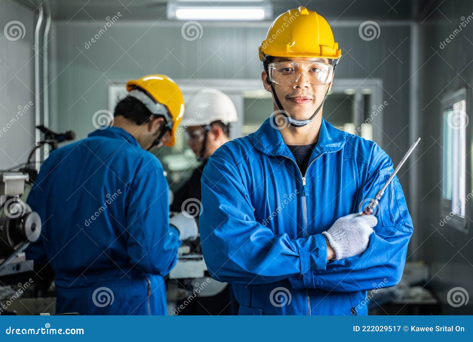 Asian Mechanical Workers Working on Milling Machine. the Technicians ...