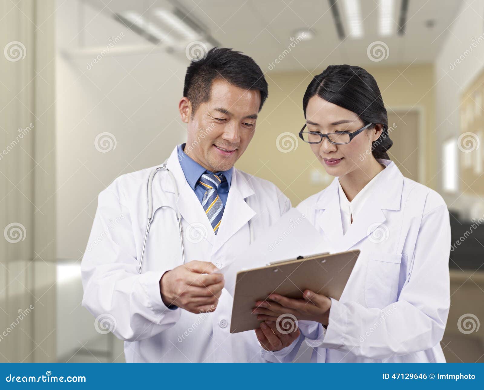 Asian Medical Professionals Stock Photo - Image of checking, chinese ...