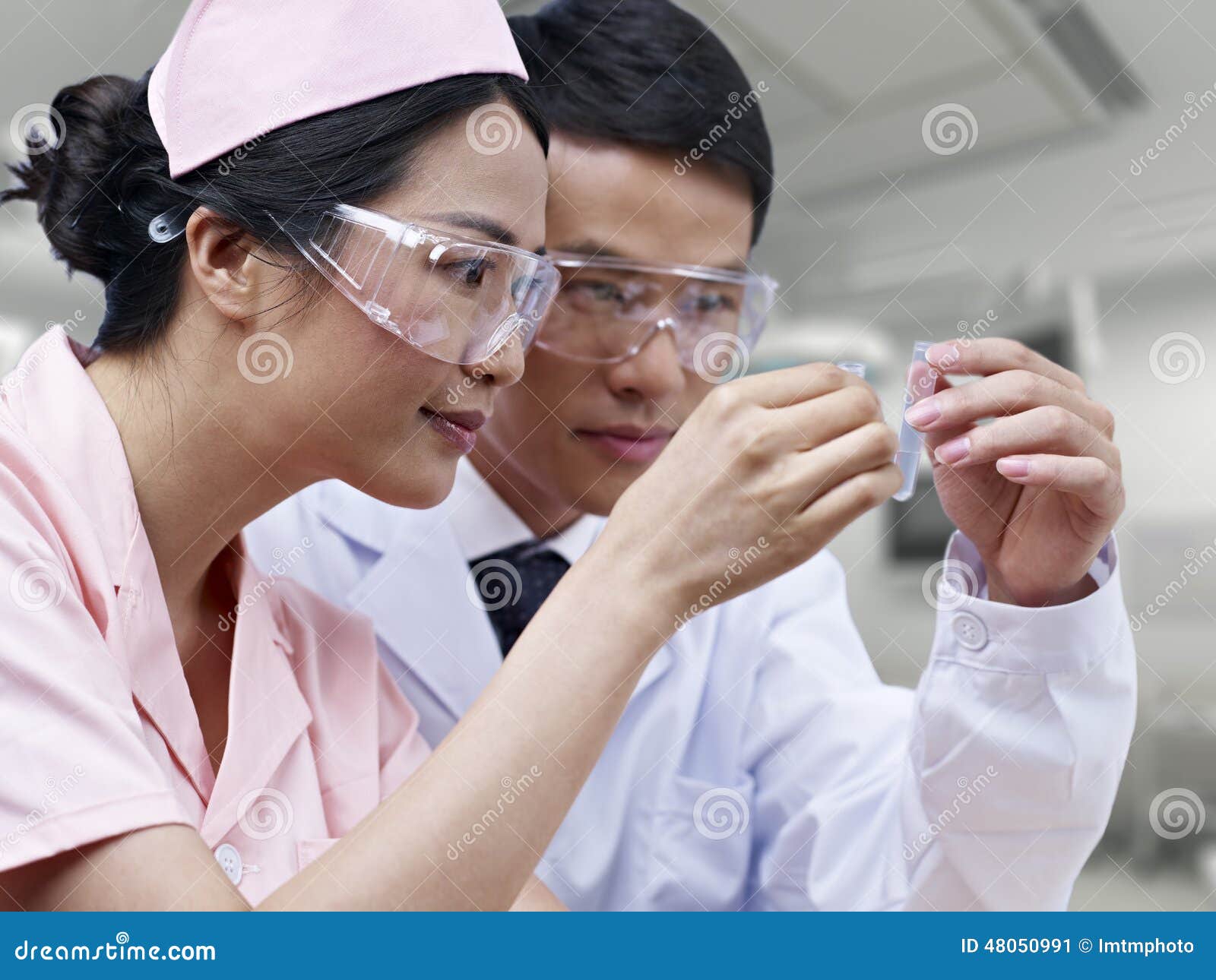 Asian Medical Professionals at Work Stock Image - Image of hospital ...