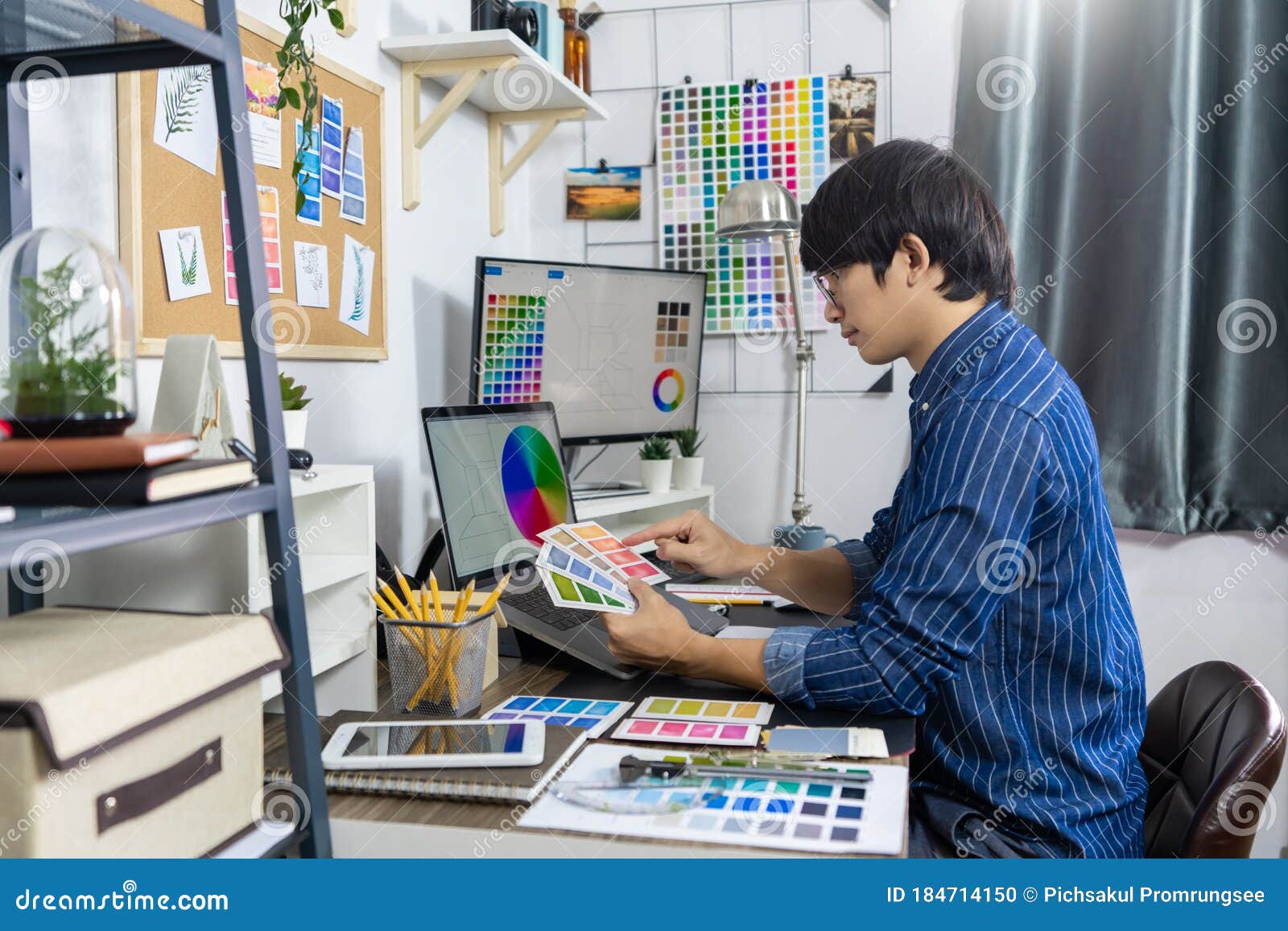 Asian Men Architect or Graphic Designer Designing a Layout Selection ...