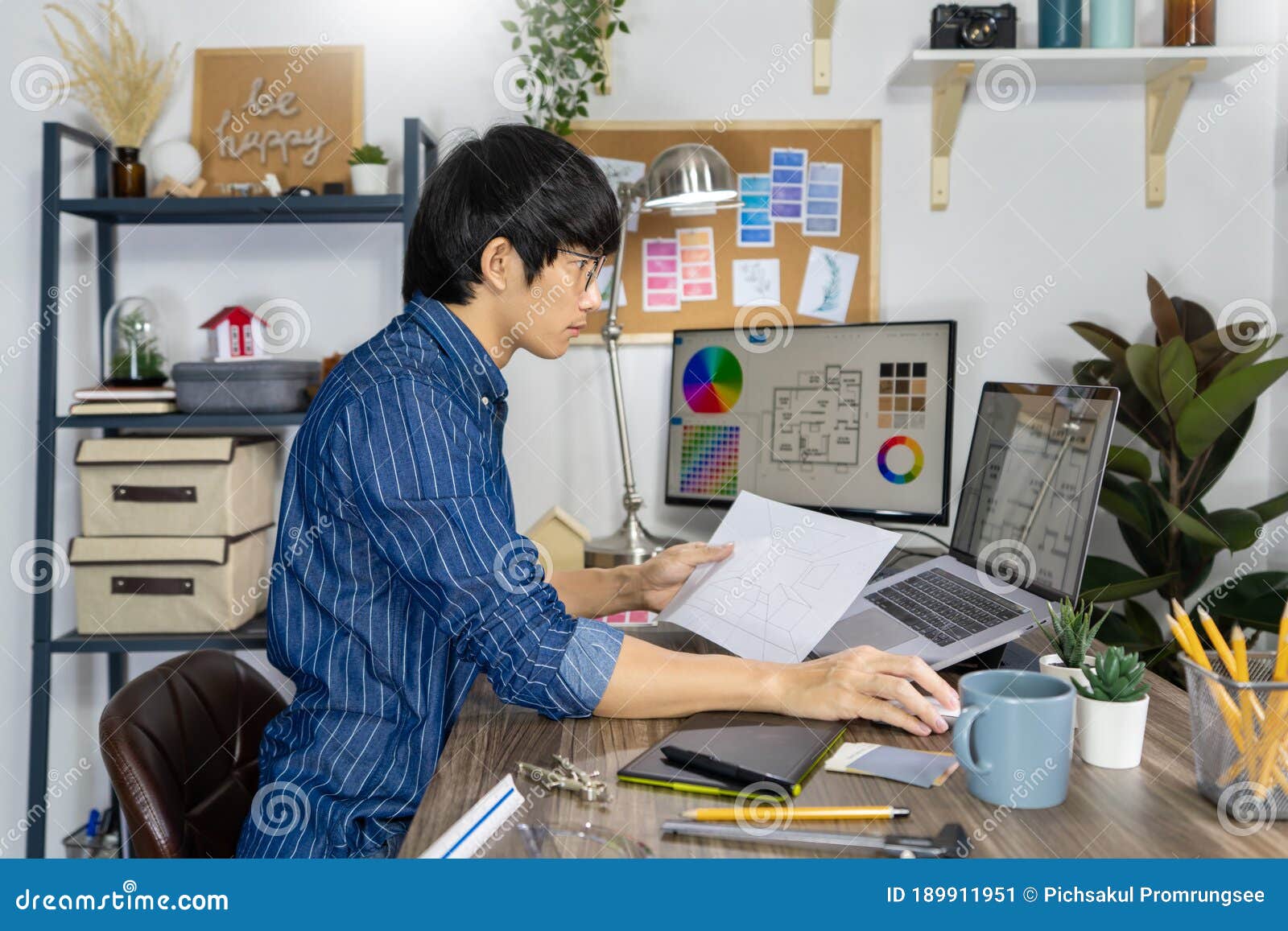 Asian Men Architect or Graphic Designer Designing a Layout Selection ...