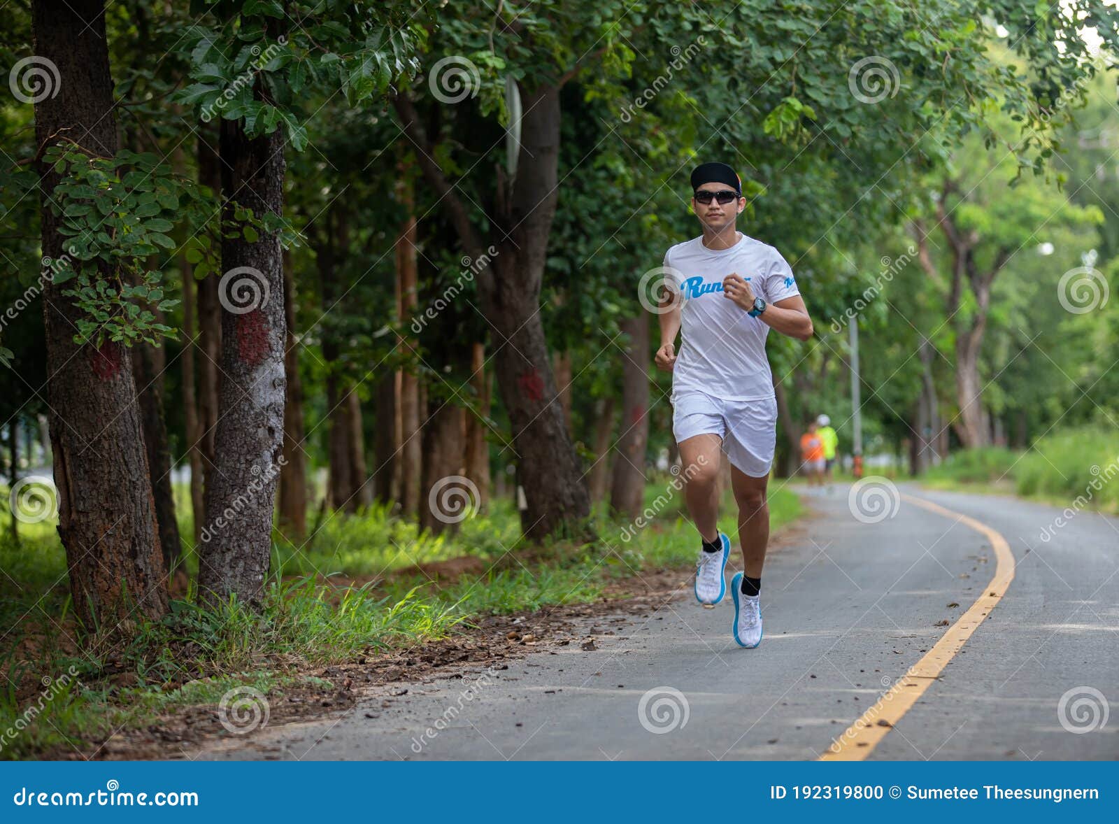 Asian Men Jogging and Running in the Park Stock Photo - Image of person ...
