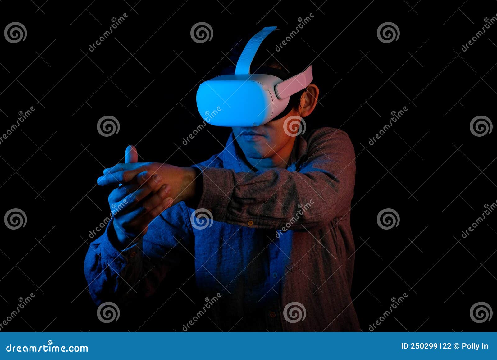 Asian Men is Playing VR Shooting Game on Black Background Under the ...