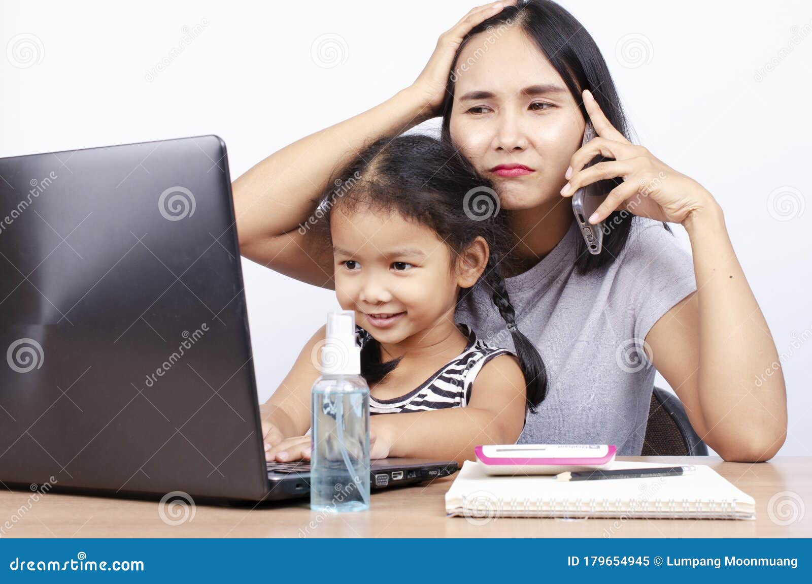 Asian Mom Adn Baby Kids Using Computer for Working from Home Concept ...