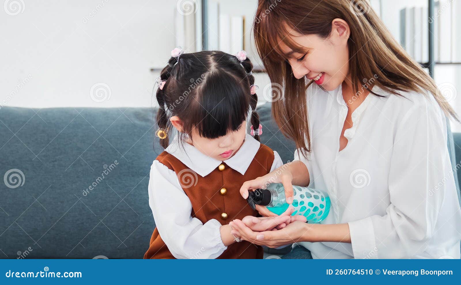 Asian Mother and Daughter Washing Hands with Alcohol Gel or ... Asian Mother and Daughter Washing Hands with Alcohol Gel or ...