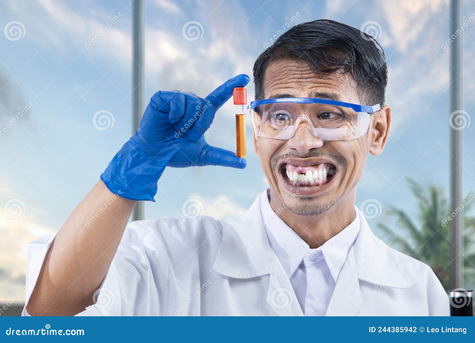 Asian Nerd Scientist Holding a Sample Tube Stock Photo - Image of ...