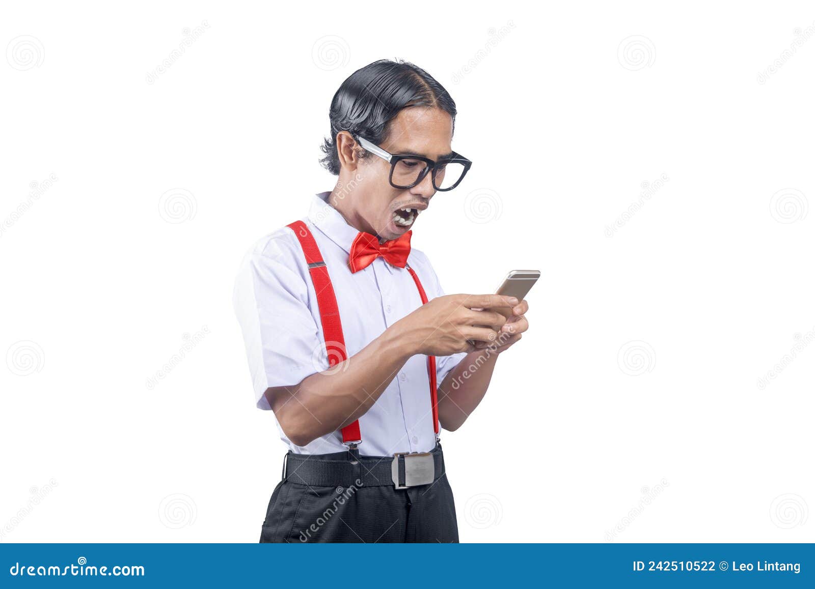 Asian Nerd with an Ugly Face Holding Mobile Phone with Shocked ...