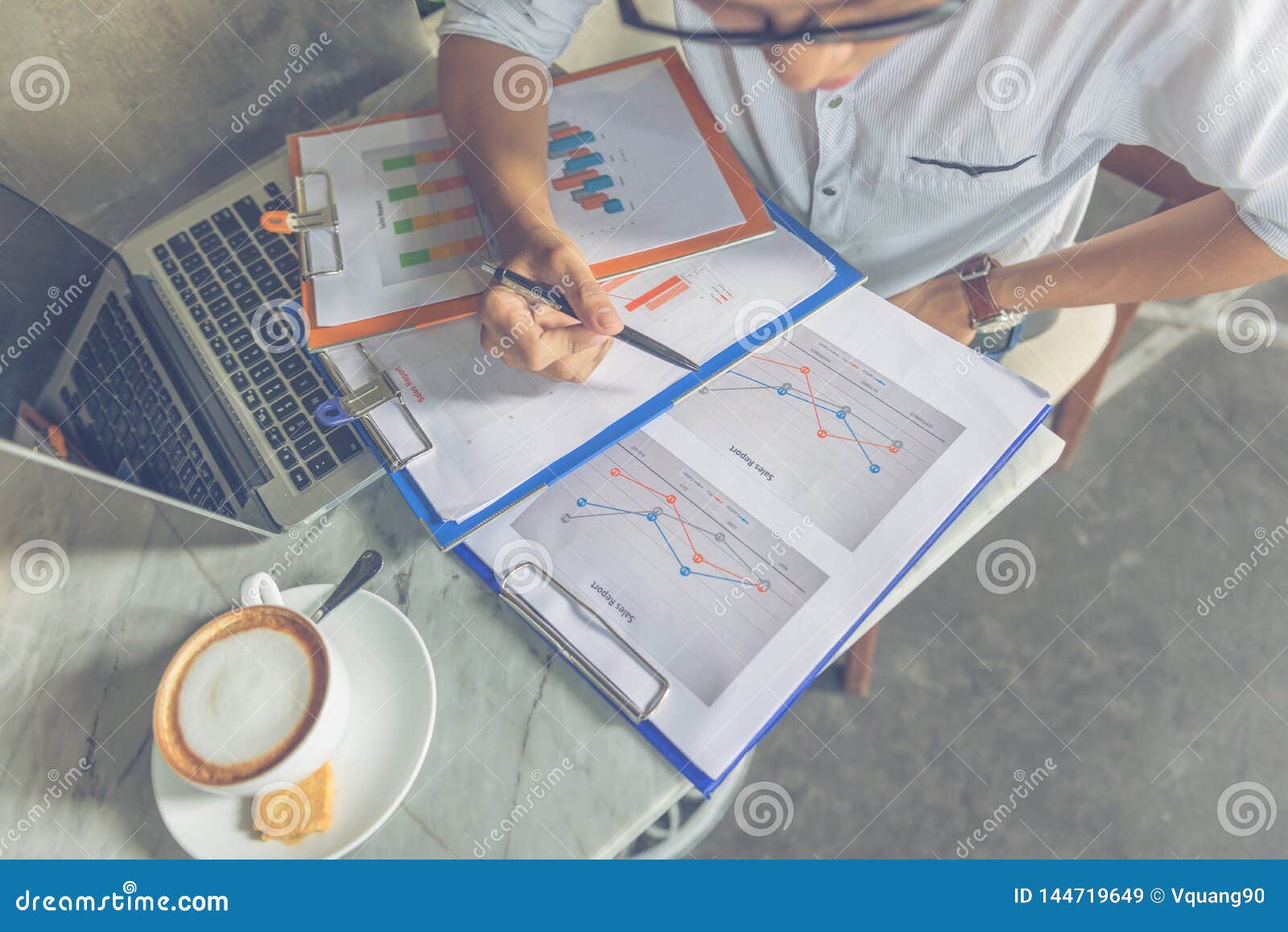 Asian Office Manager Checking Data on Sales Report Stock Image - Image ...