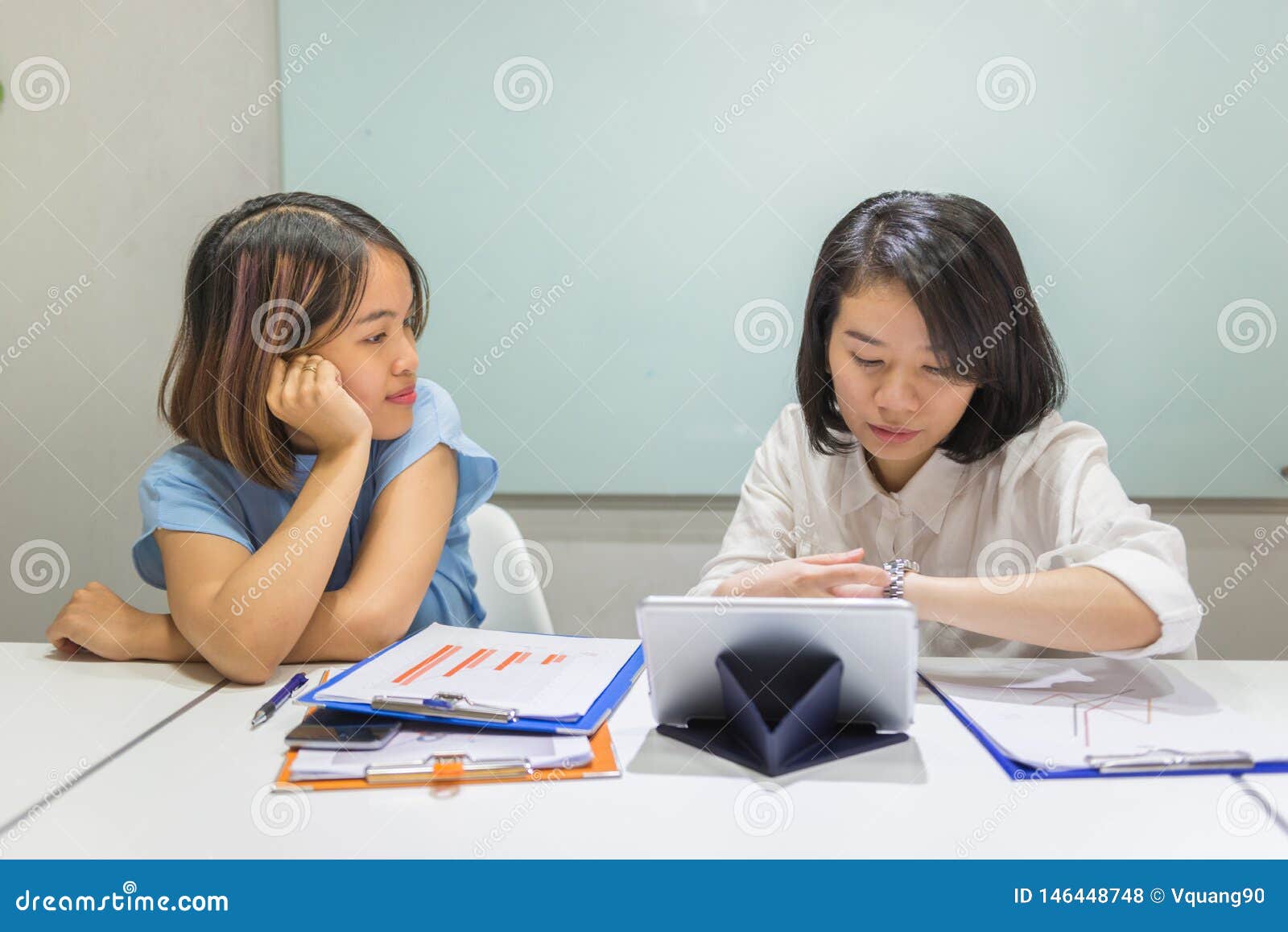 Asian Office Staff Talk To Each Other in Office Stock Photo - Image of ...