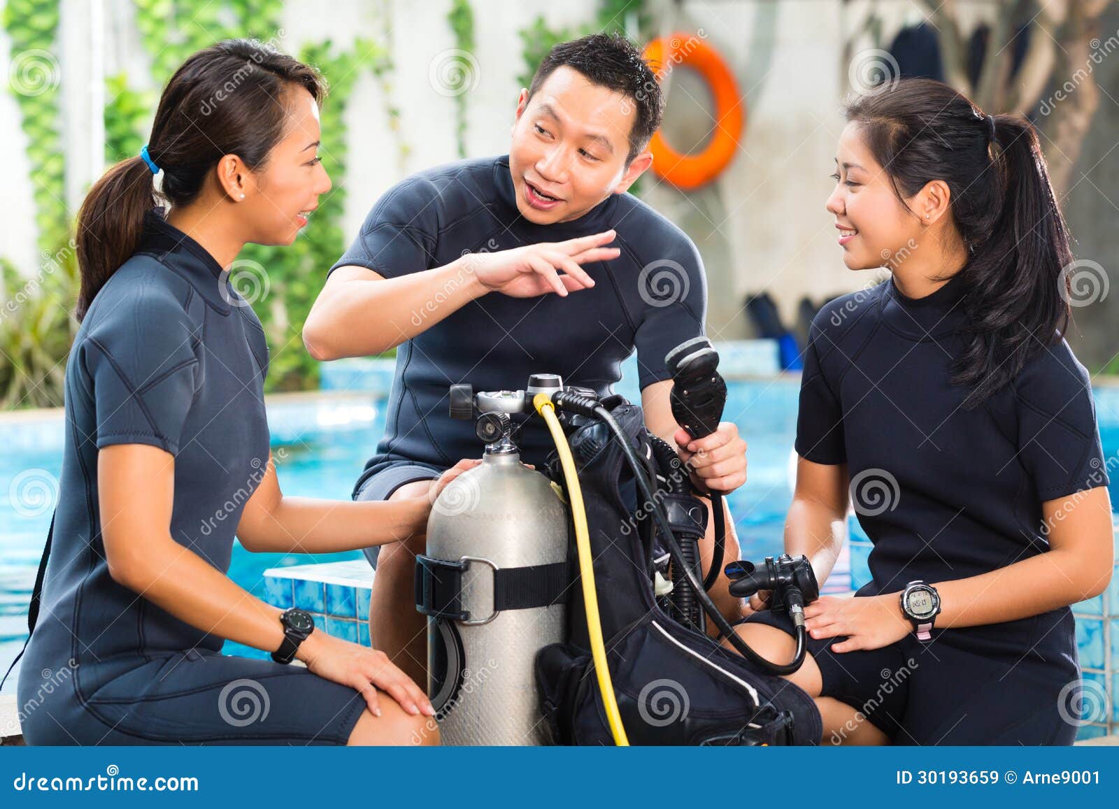 People in a diving school stock image. Image of couple - 30193659