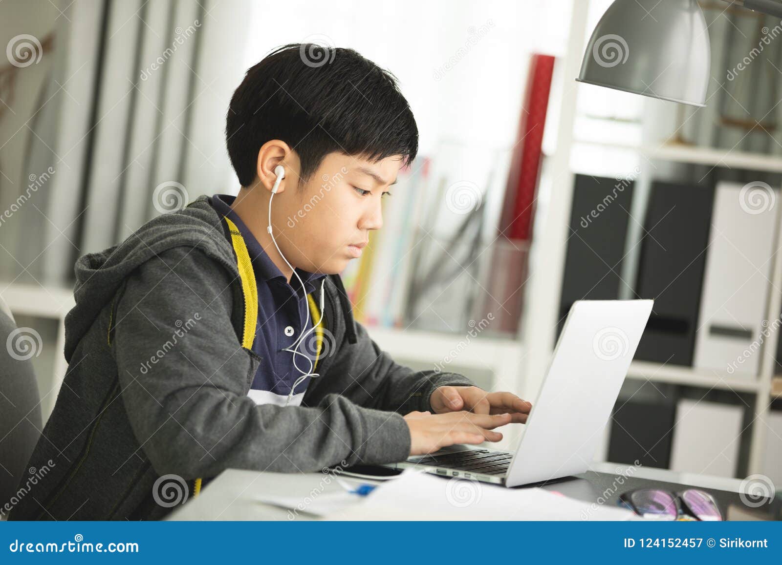 Asian Preteens Doing Your Homework with Laptop. Stock Image - Image of ...