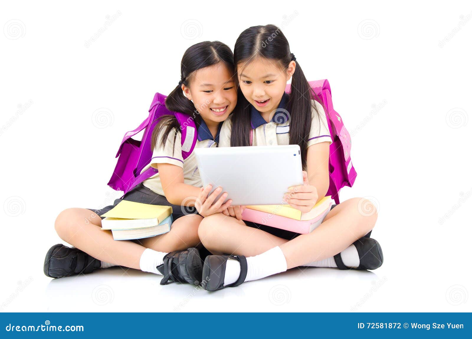 Asian Primary School Student Using Tablet In Classroom Stock Image ...