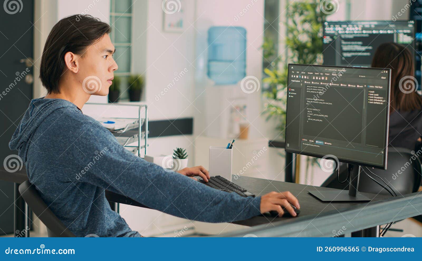 Asian Programer Typing Big Data Code On Computer To Work On App Developing Program Royalty Free