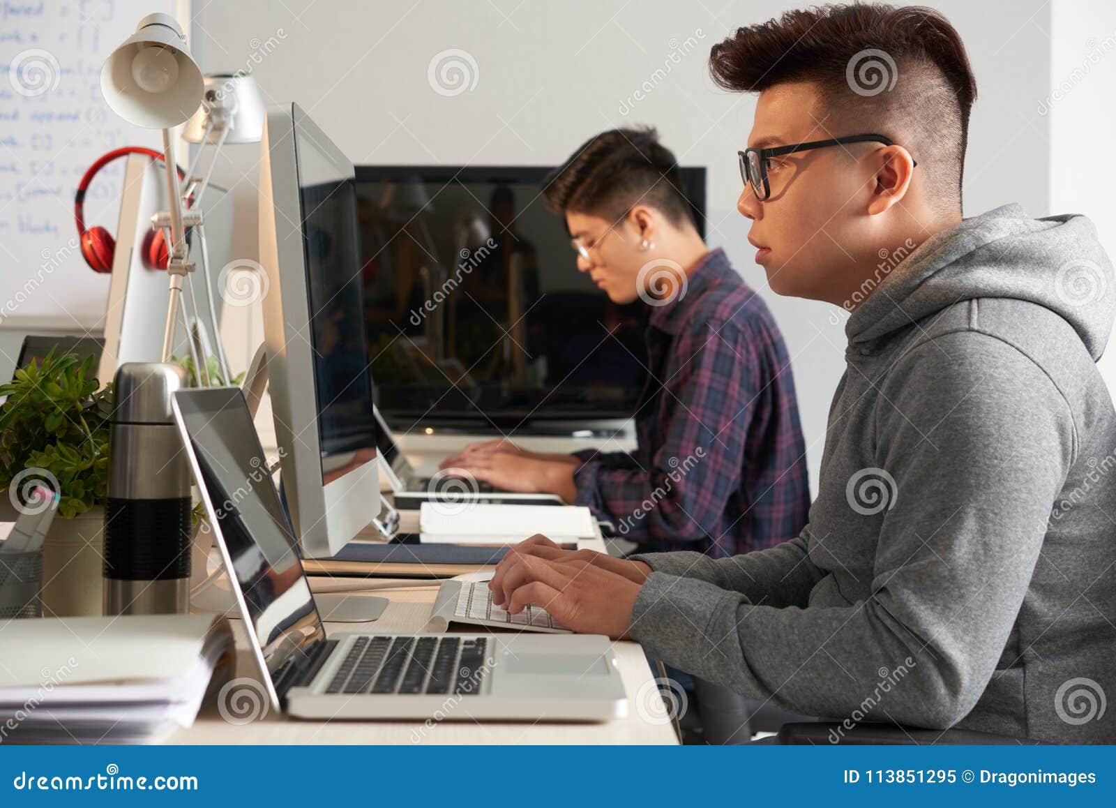 Asian Programmers Wrapped Up in Work Stock Image - Image of coding ... Asian Programmers Wrapped Up in Work Stock Image - Image of coding ...