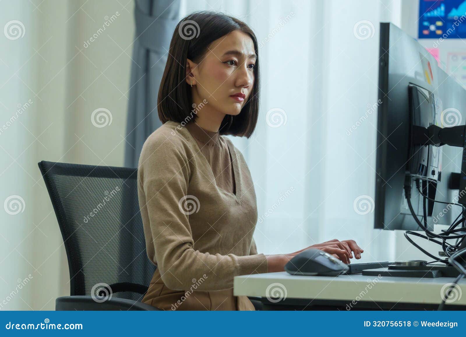 Asian Prompt Engineer Develop Coding App With Software Data Sitting In Front Of Computer Monitor