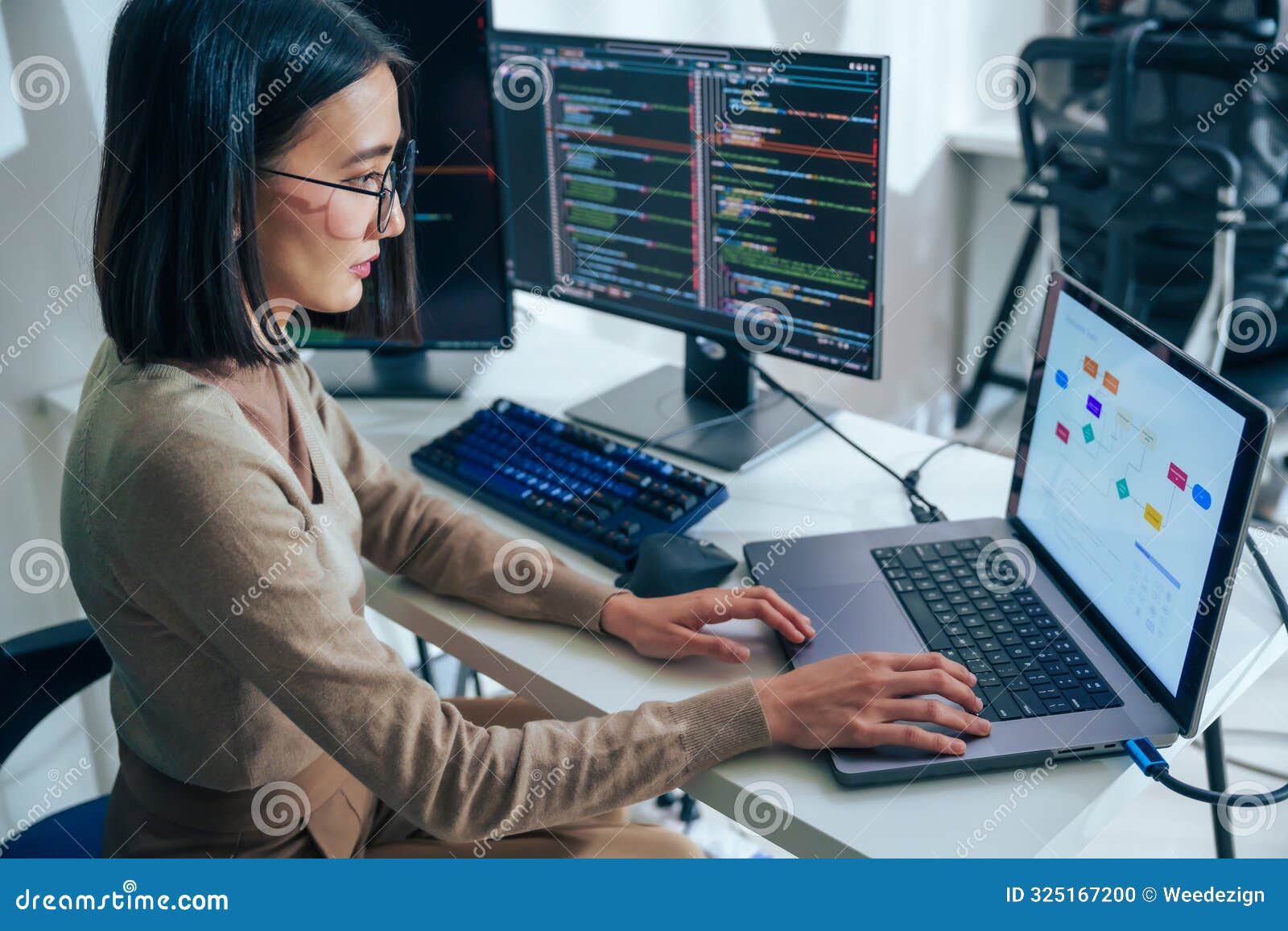 Asian Prompt Engineer Develop Coding App with Software Data Sitting in ...