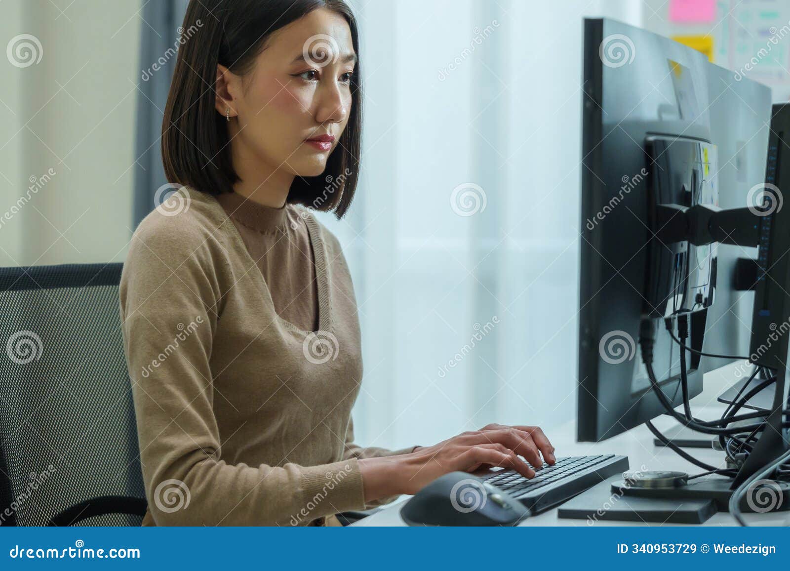 Asian Prompt Engineer Develop Coding App with Software Data Sitting in ...