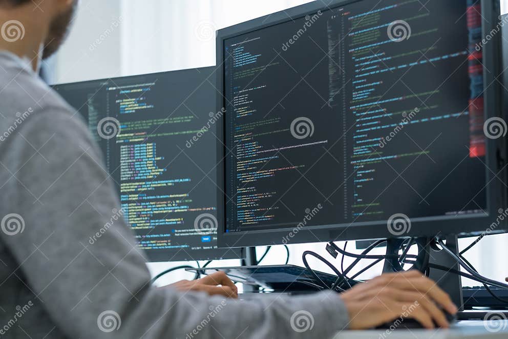 Asian Prompt Engineer Developer Coding App With Software Data Sitting