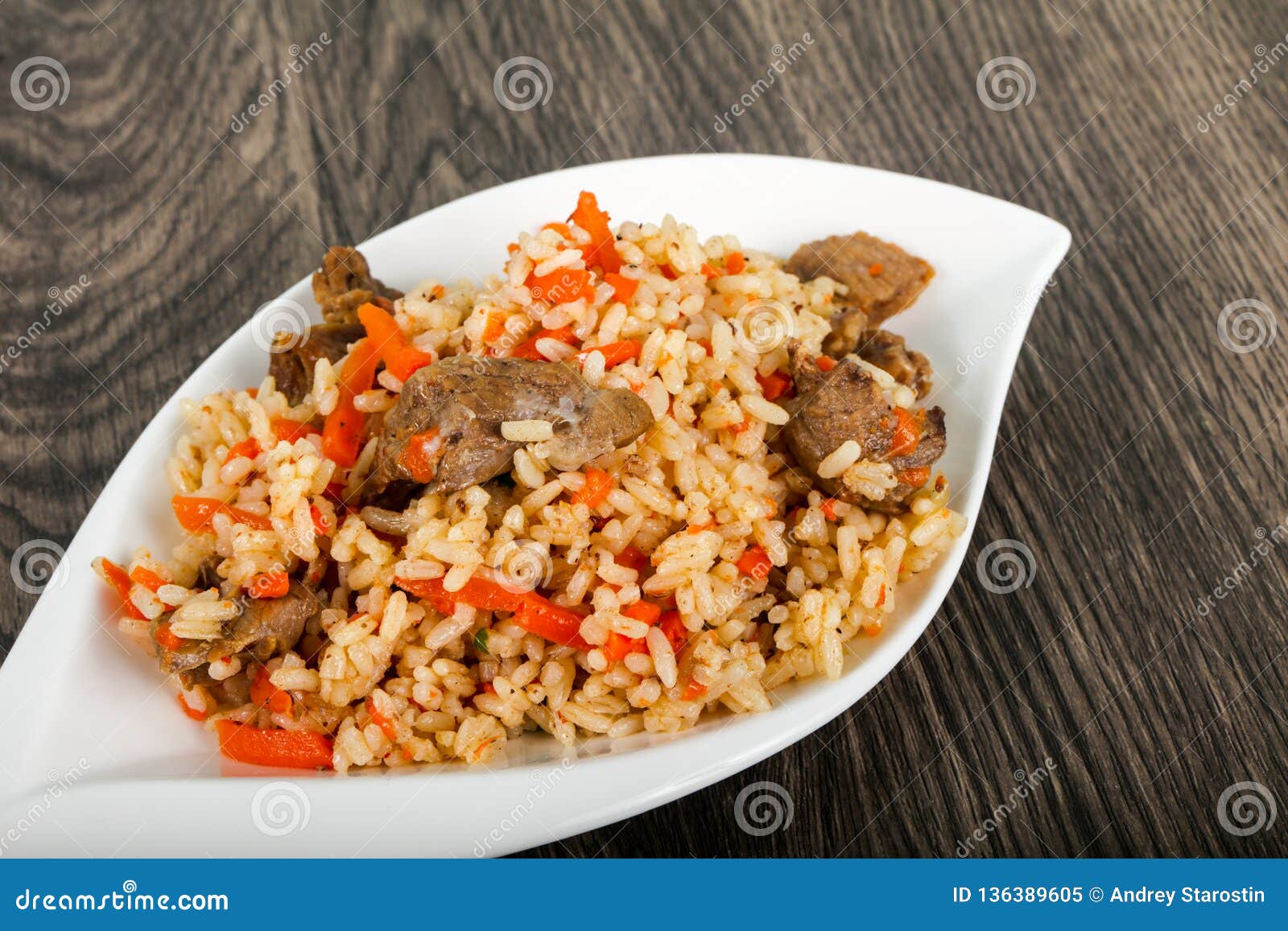 Asian rice - Plov stock image. Image of dish, onion - 136389605