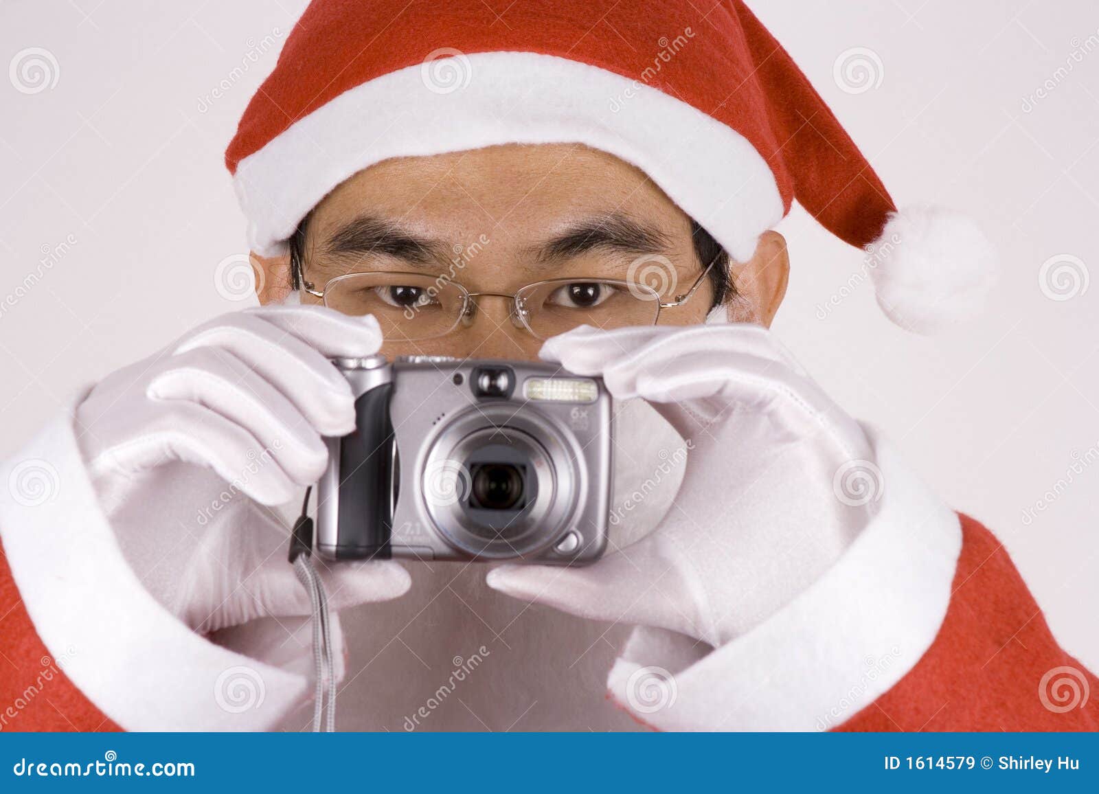 Asian Santa Claus with Camera Stock Image - Image of male, asian: 1614579