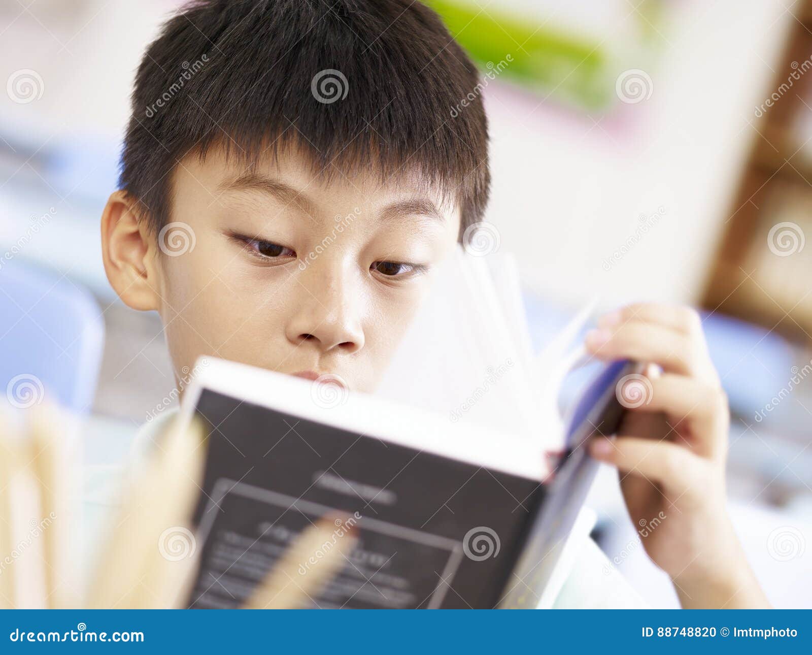 Asian School Boy Reading a Book Stock Photo - Image of kong, korean ...