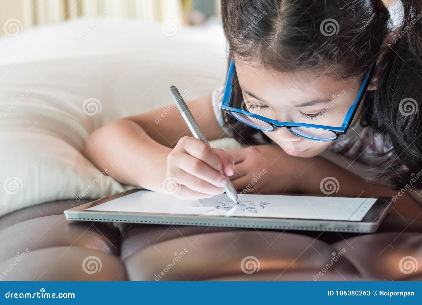 Asian School Child Girl Using Smart Tablet Device Digital Technology ...