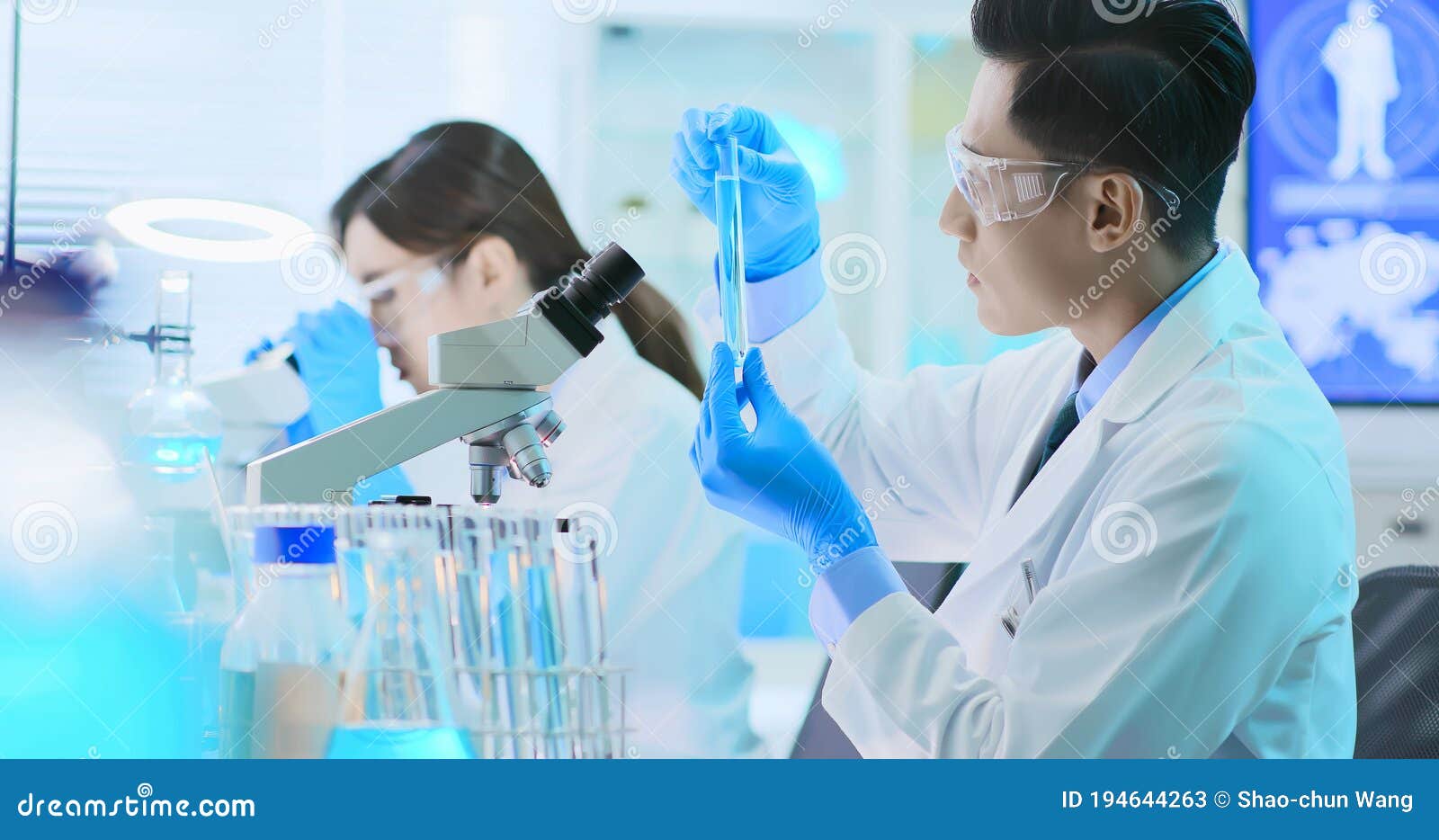 Asian Scientist Use Microscope Stock Image - Image of equipment ...