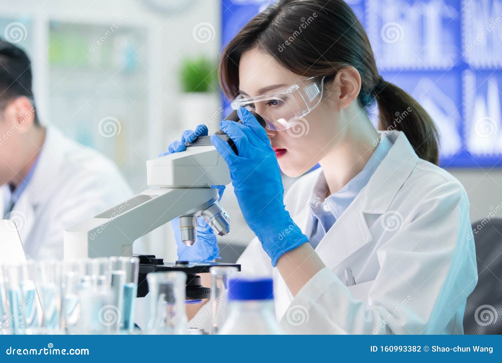 Asian Scientist Use Microscope Stock Photo - Image of people, girl ...