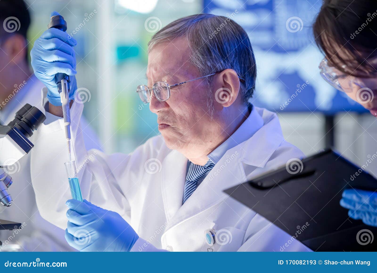 Asian Scientist Use Microscope Stock Image - Image of experiment ...