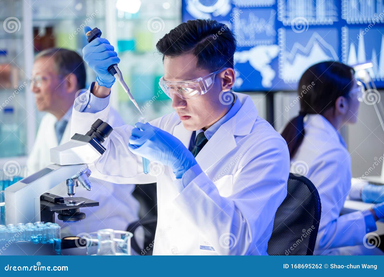 Asian Scientist Use Microscope Stock Photo - Image of expertise ...
