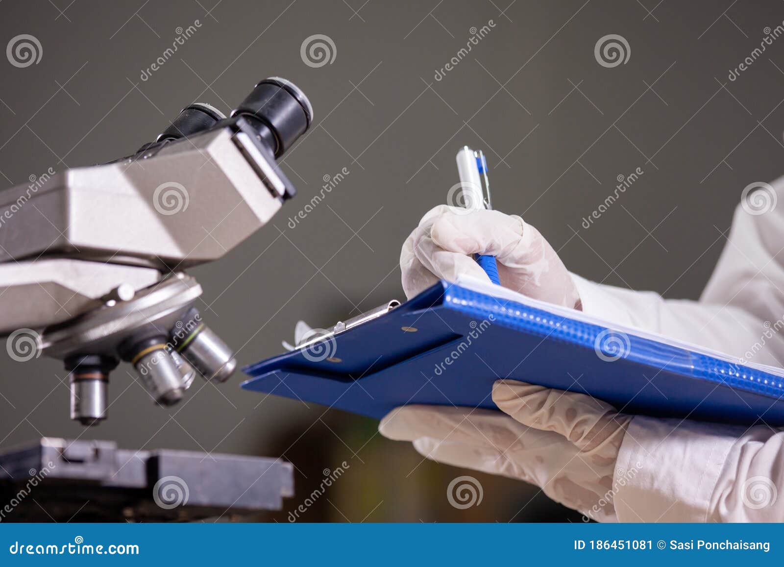 Scientist is Writing Data after Analysis and Research Chemical Test in ...