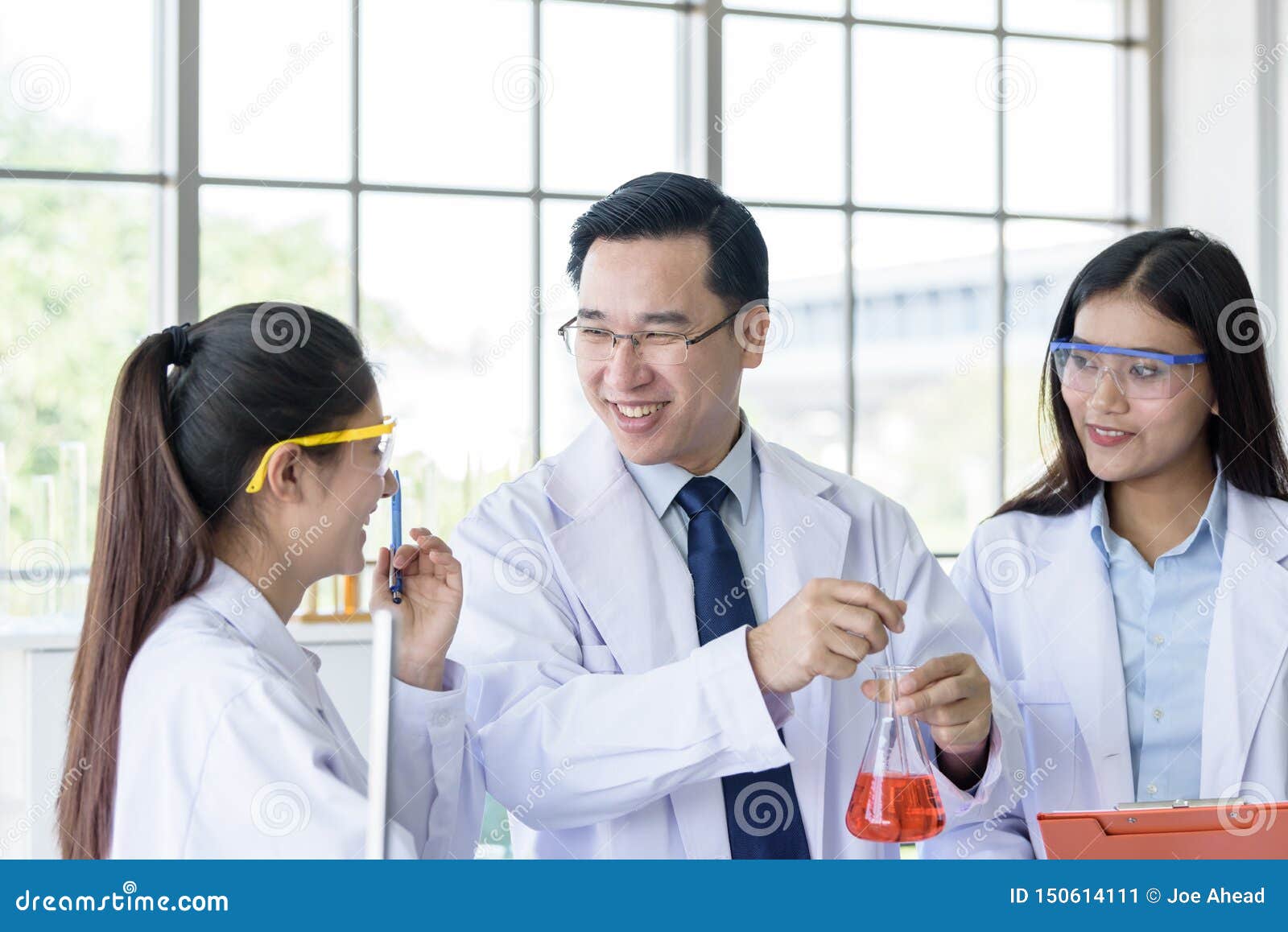 Asian Senior Laboratory Scientist Man Working at Lab with Asian Young ...