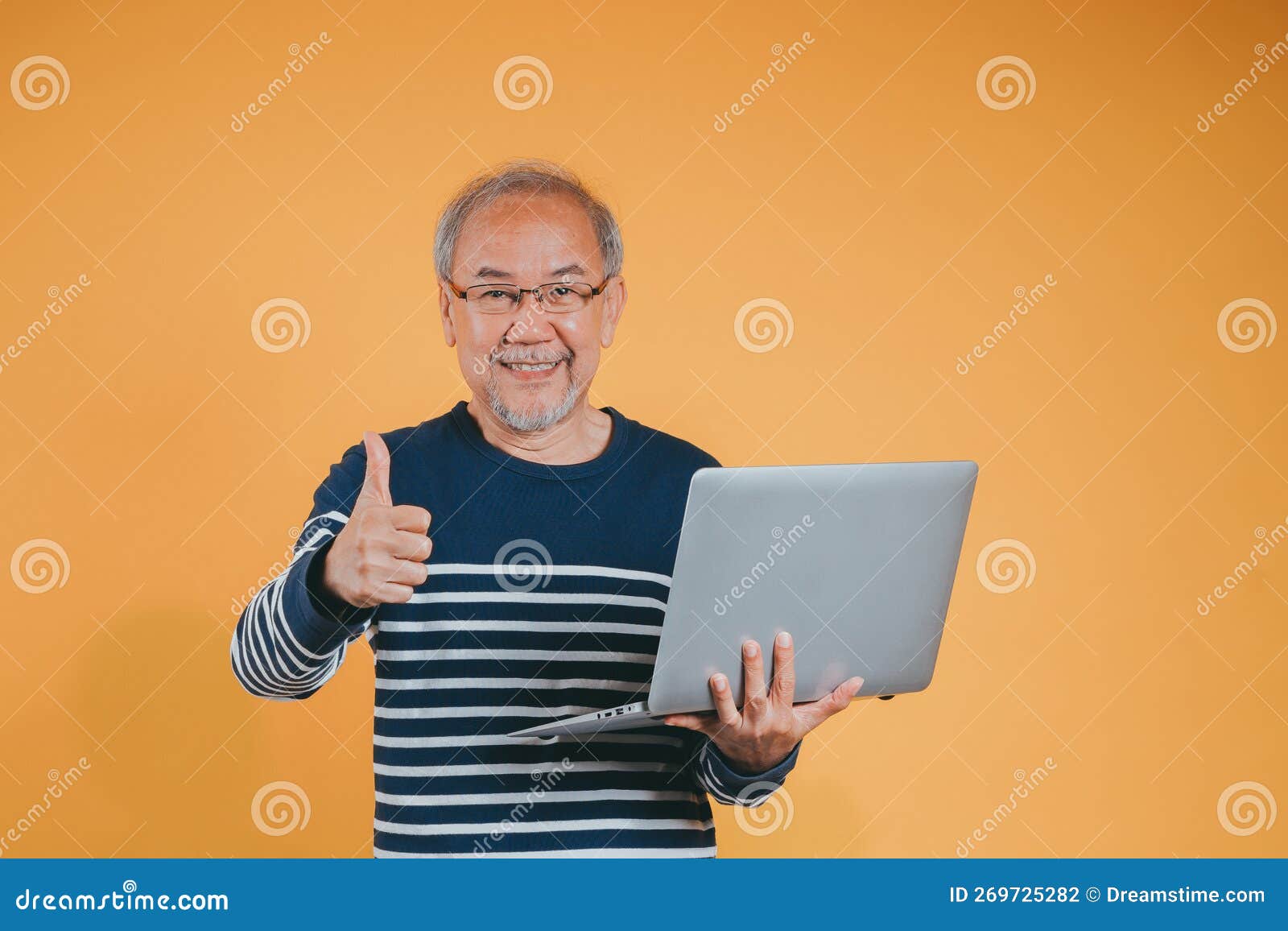 Asian Senior Man Using Laptop Computer for Working after Retirement on ...