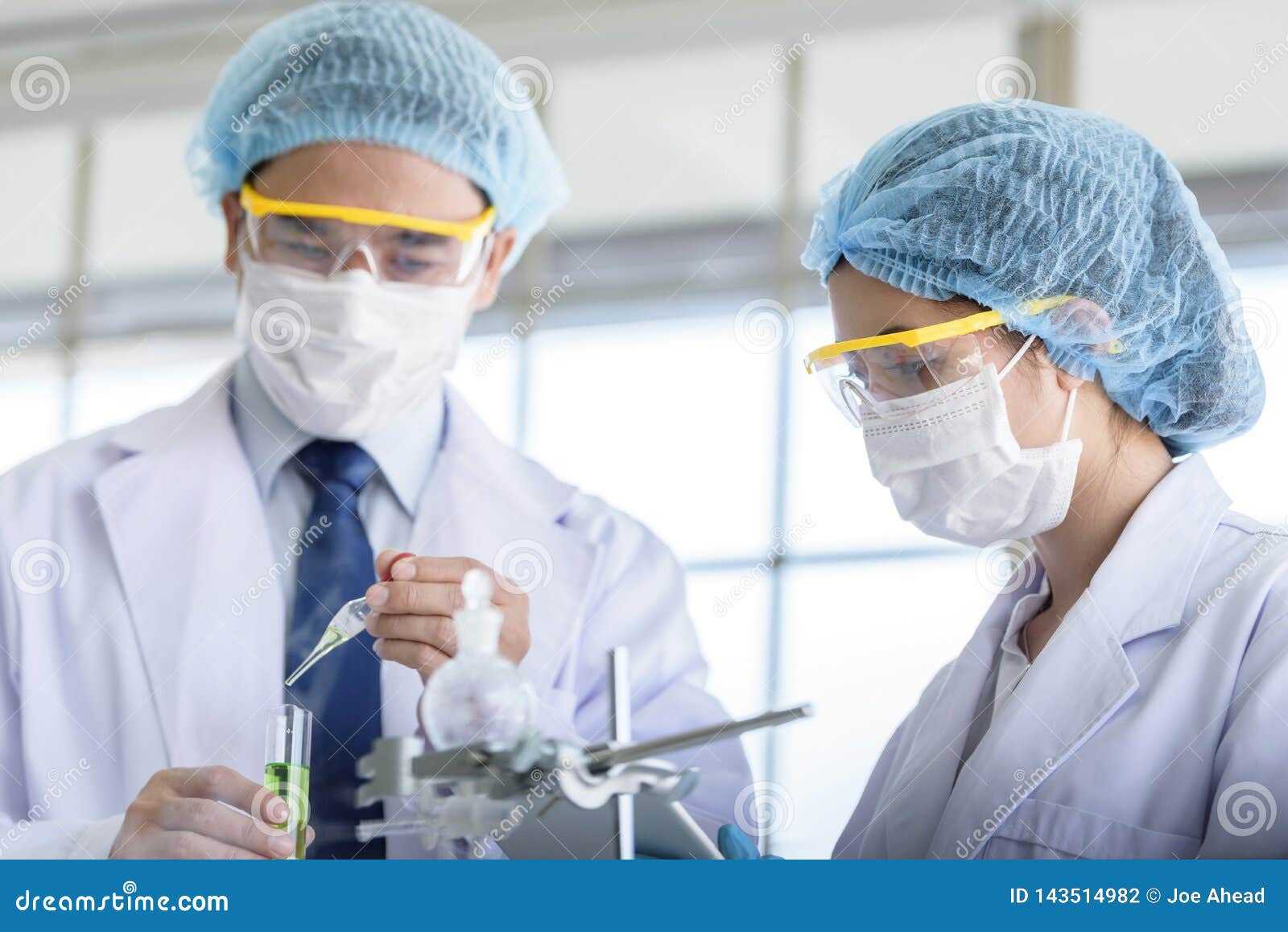 Asian Senior Scientist Have Teaching Young Student Scientist in a ...