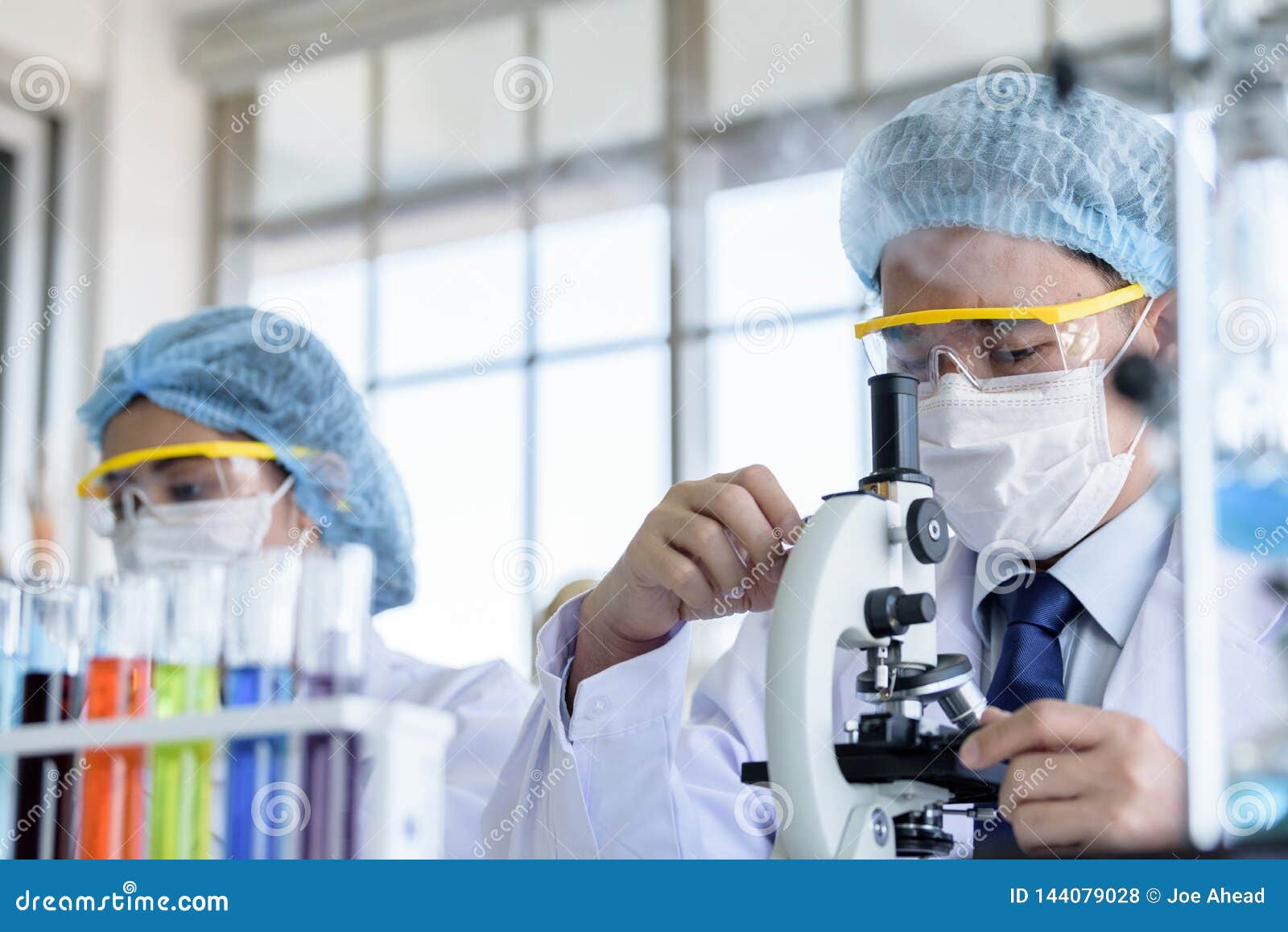 Asian Senior Scientist Have Teaching Young Student Scientist in a ...