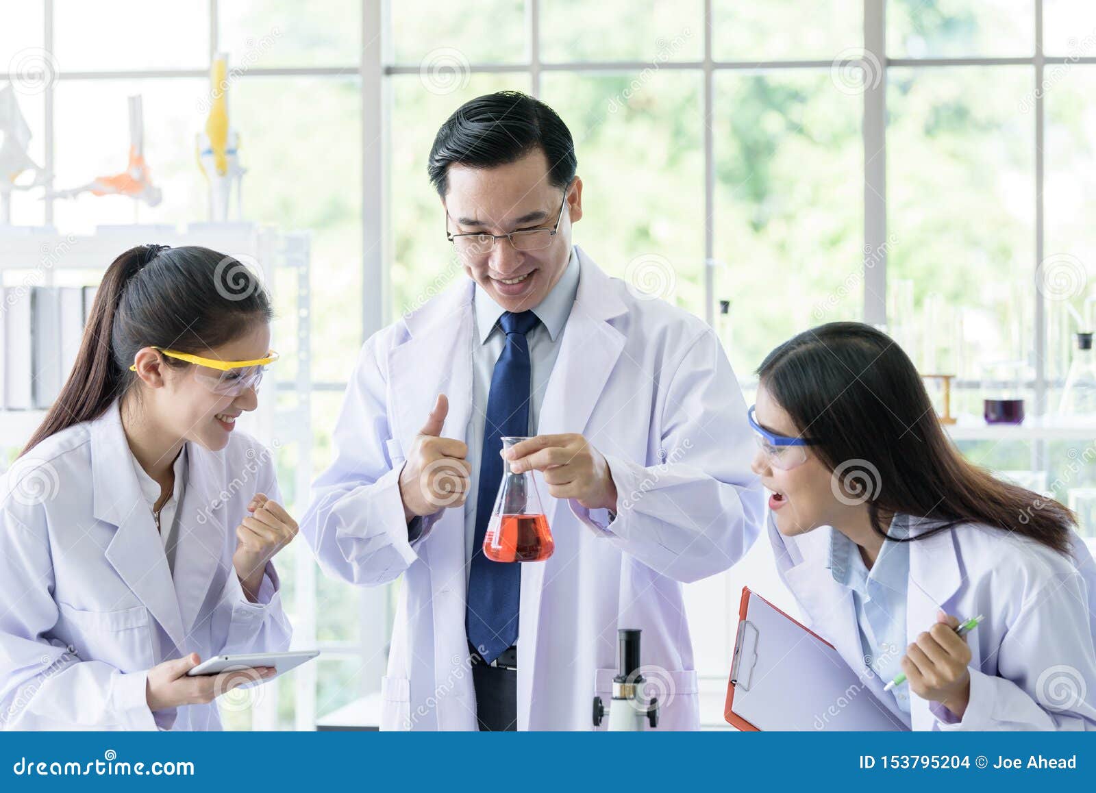 Asian Senior Scientist Have Teaching Young Student Scientist in a ...