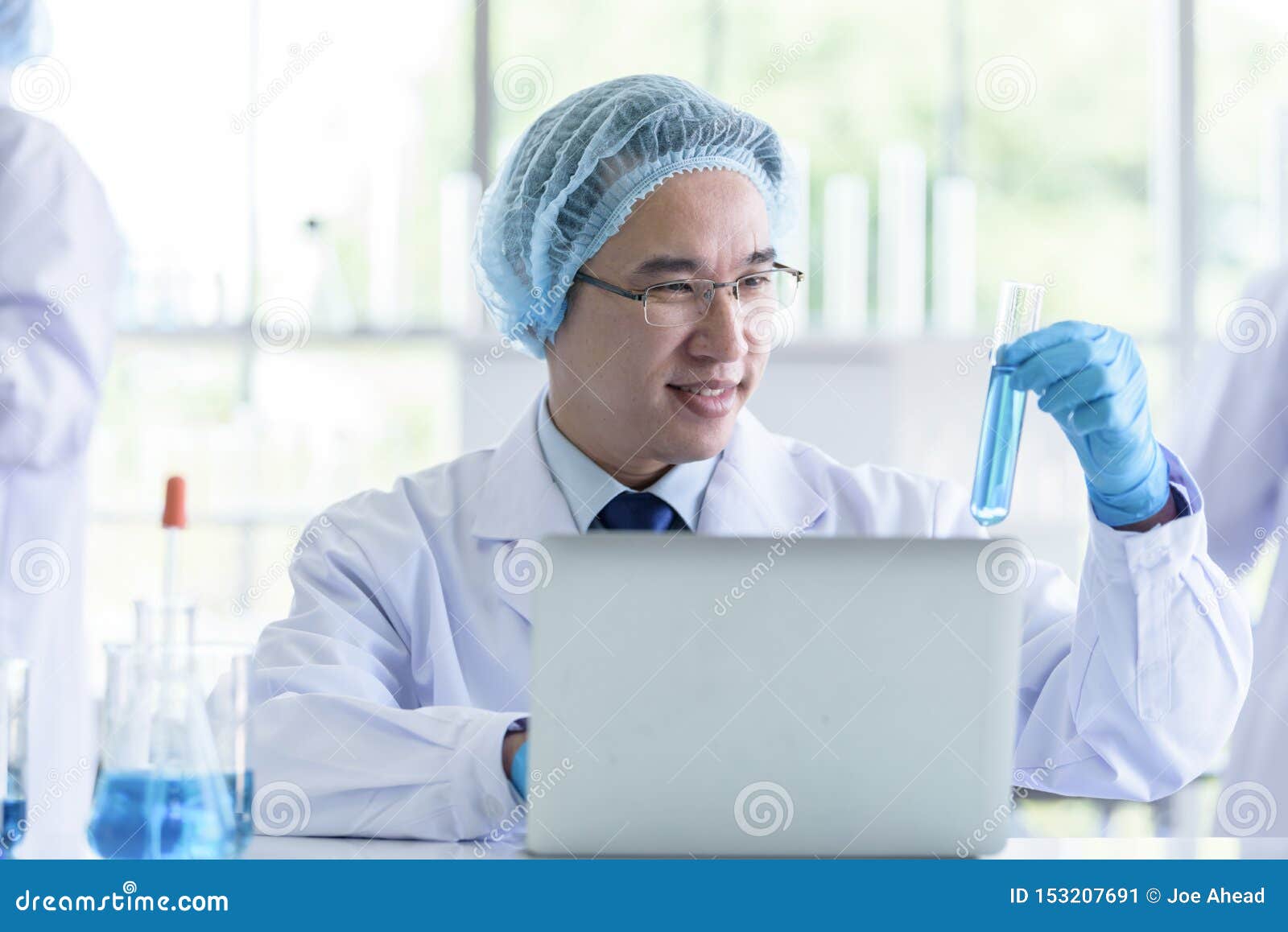 Asian Senior Scientist Male Researching and Learning in a Laboratory ...