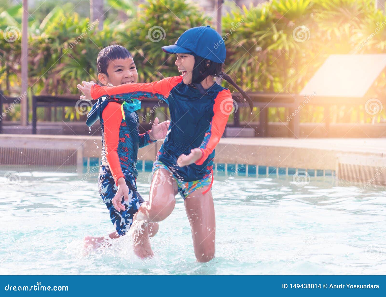 Siblings is Running and Chasing in Swimming Pool Stock Photo - Image of ...