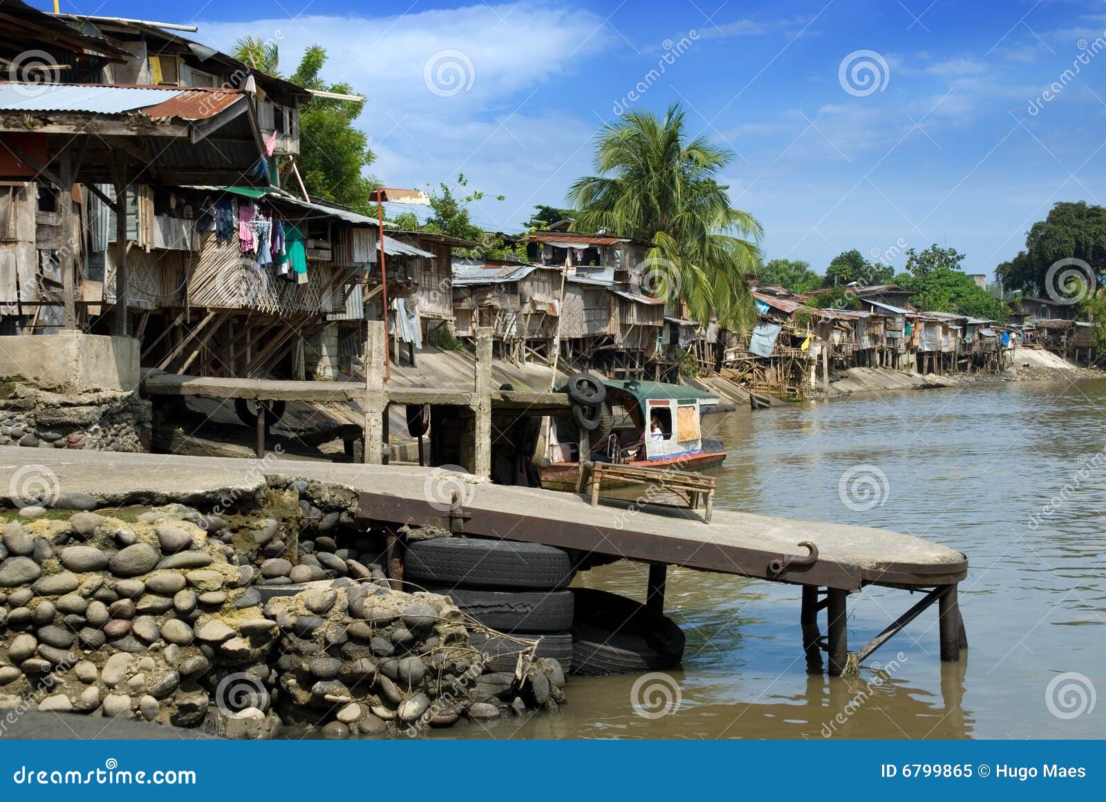 Asian slums on river bank stock image. Image of asian - 6799865