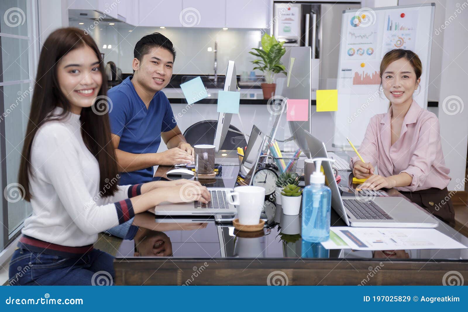 Asian Small Business Startup Multiracial Working with Laptop and ...