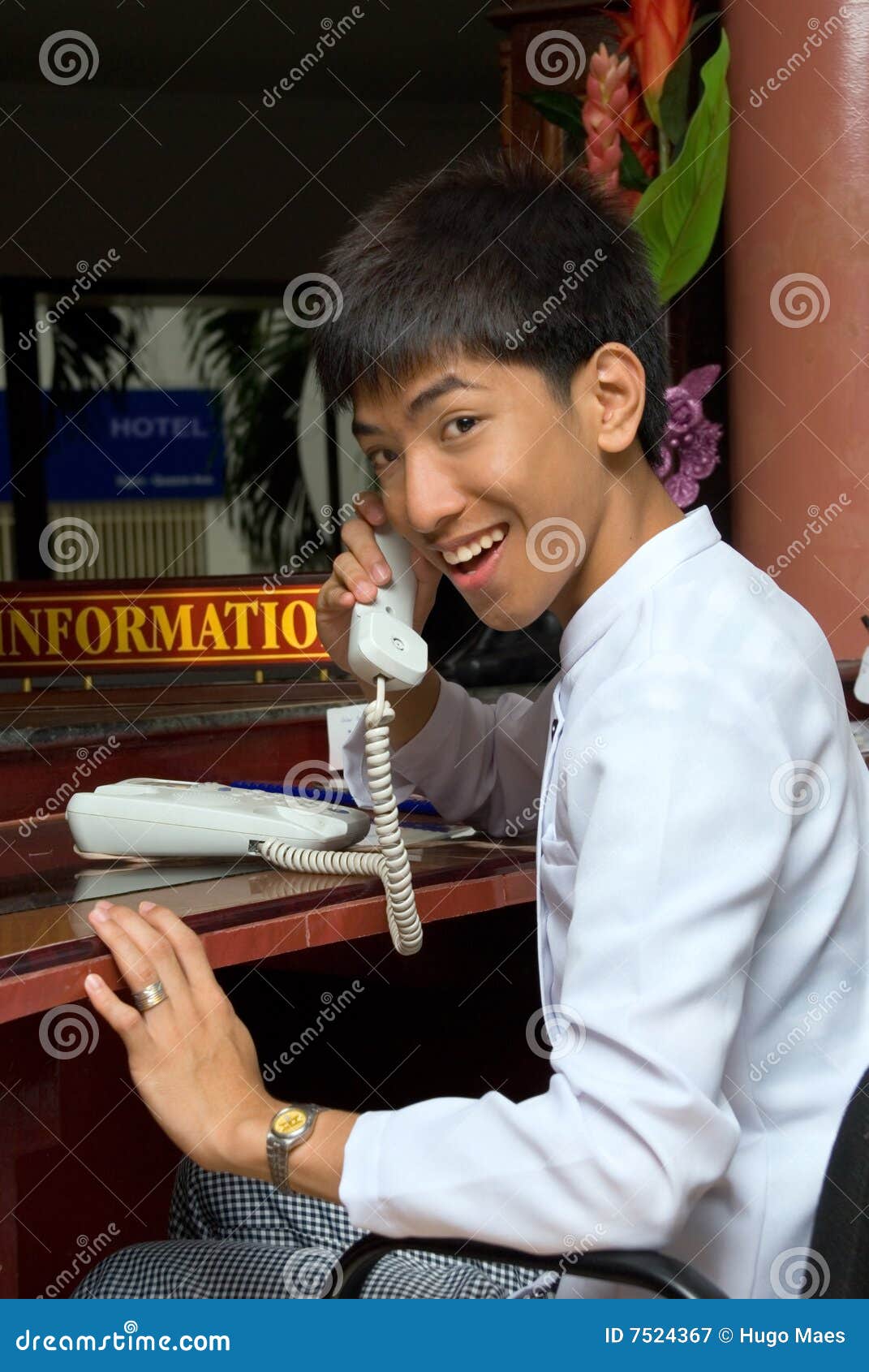 Asian Smiling Hotel Receptionist Stock Image - Image of assistance ...