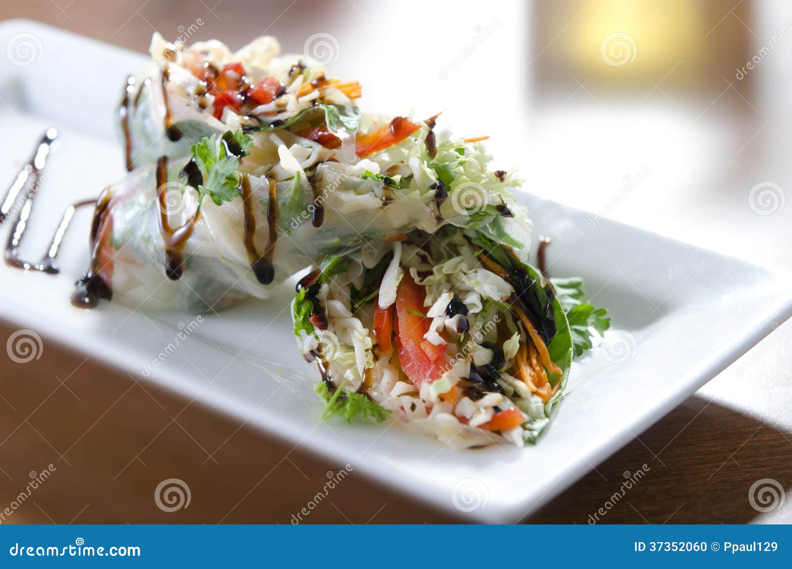 Asian Spring Rolls with Balsamic Vinaigrette Drizzle Stock Photo ...