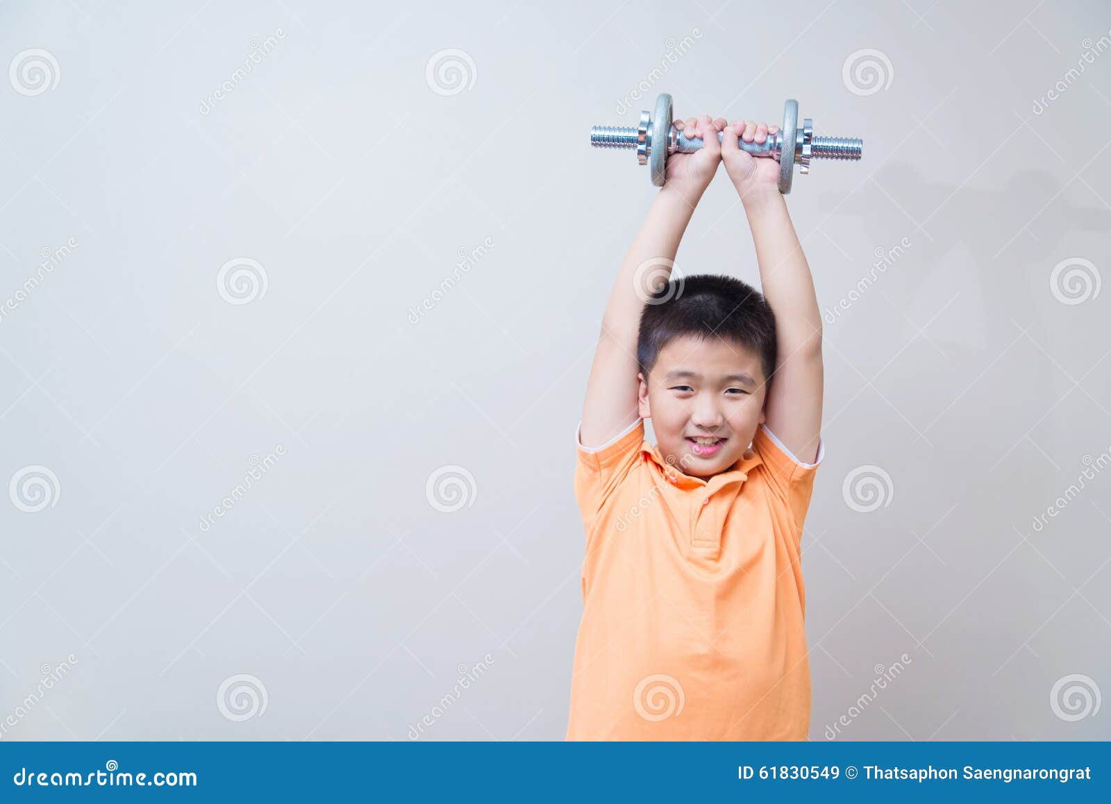 Asian Strong Boy Is Flexing His Biceps Muscle. Isolated On White ...