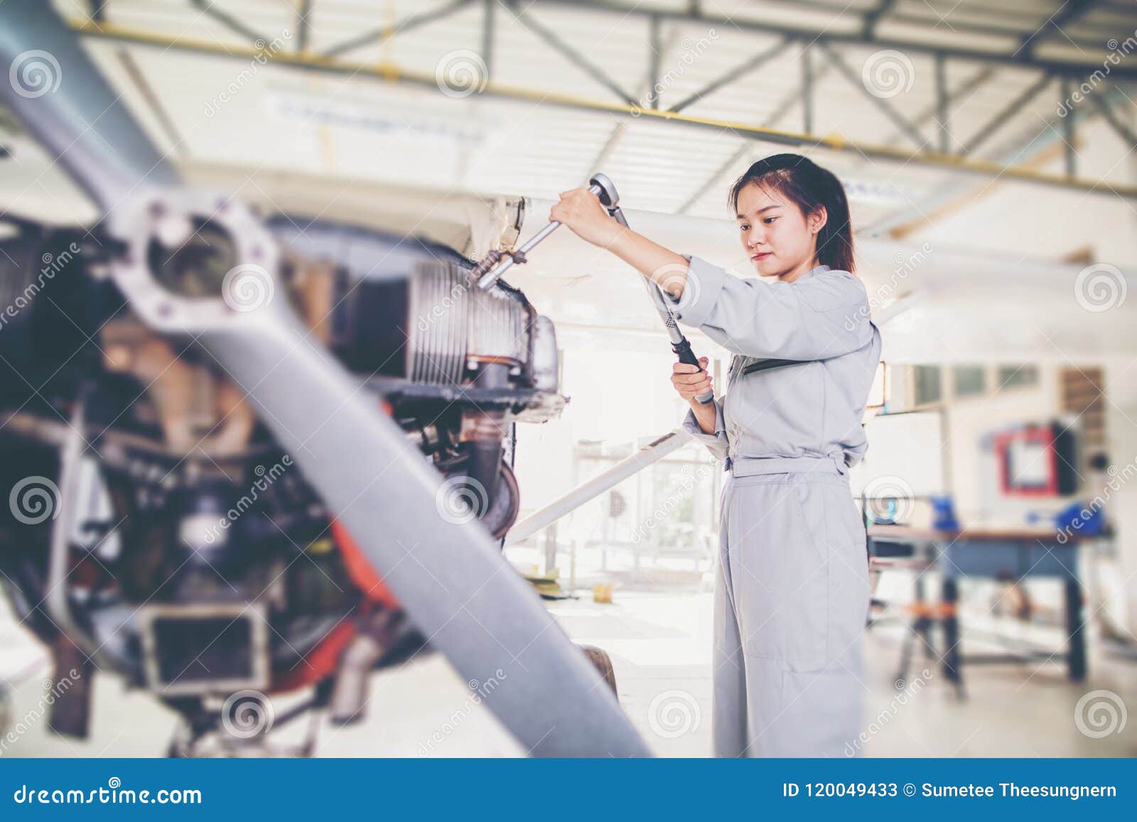 Asian Student Engineers and Technicians are Repairing Aircraft O Stock ...