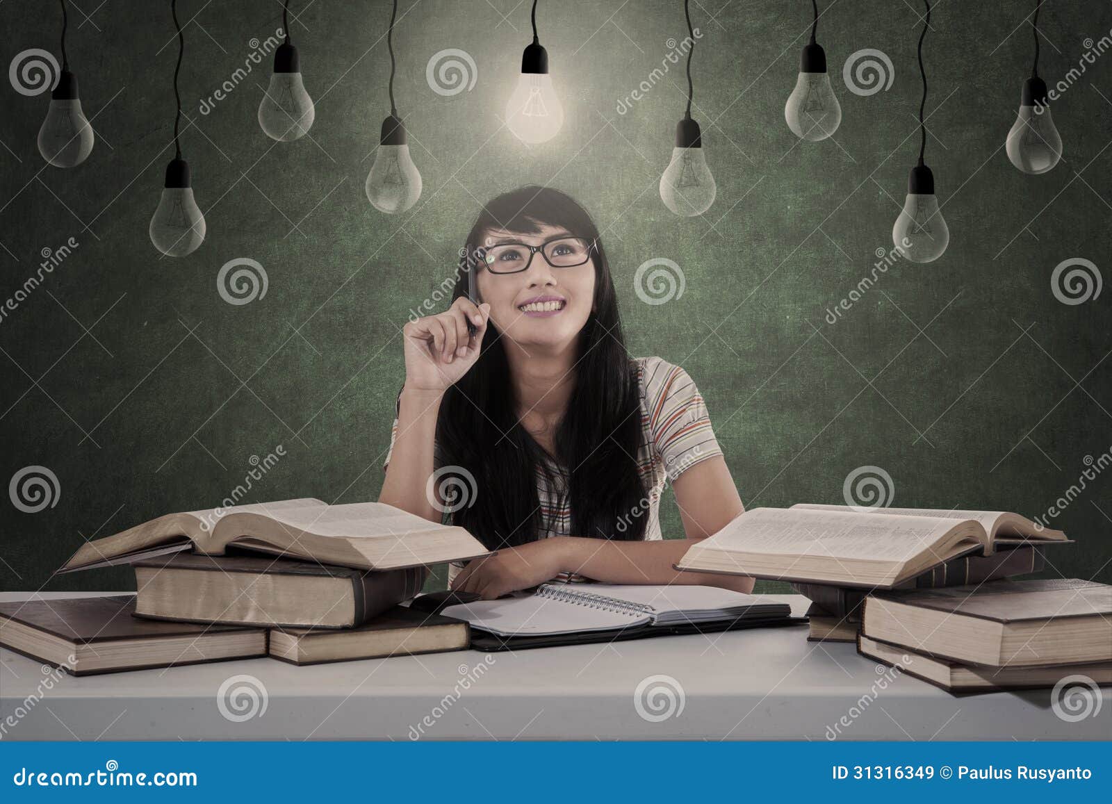 Asian Student Has Bright Idea Under Light Bulbs Stock Image - Image of ...