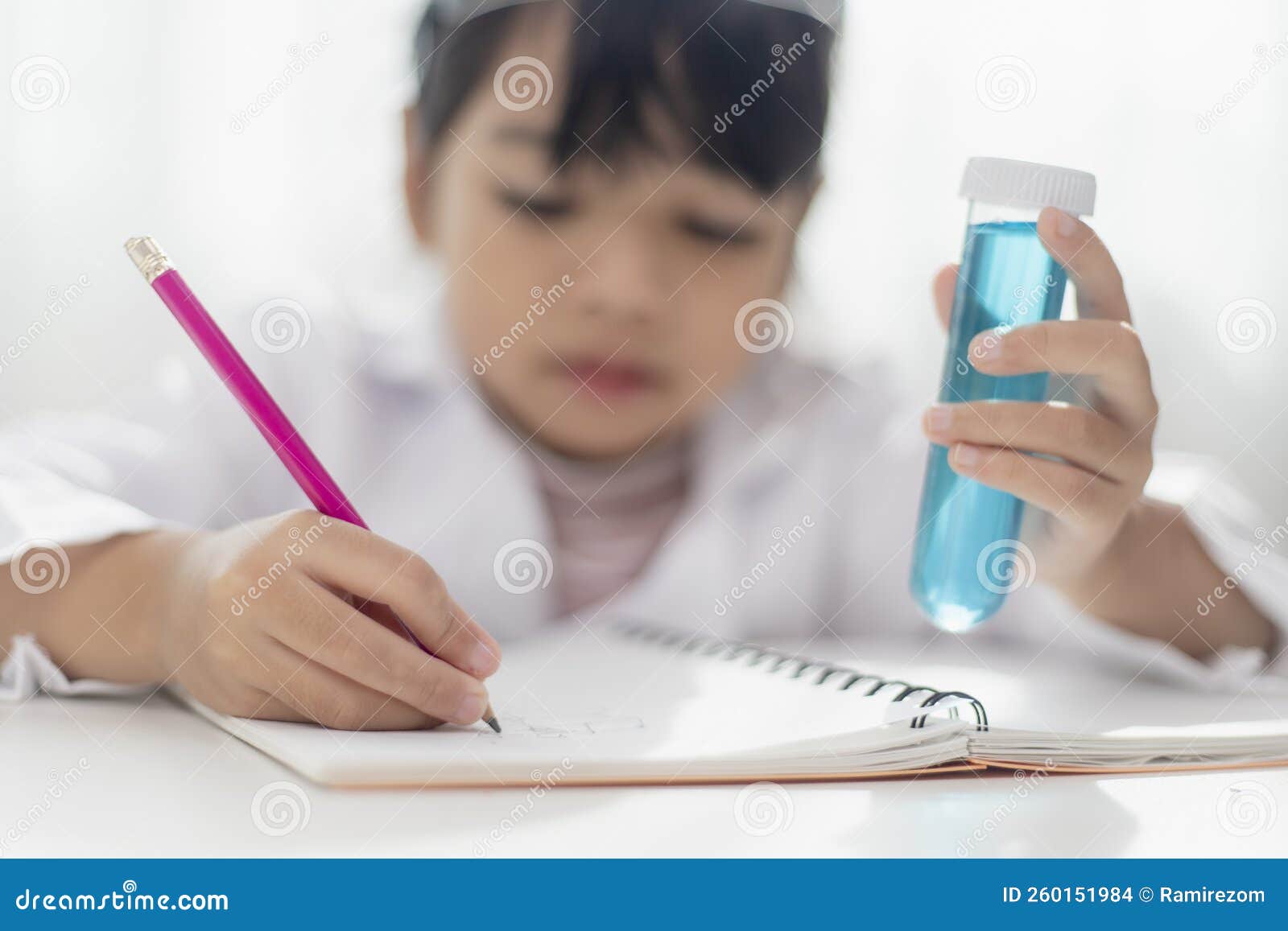Asian Student Mixing Solution in Science Experiment Laboratory Class ...