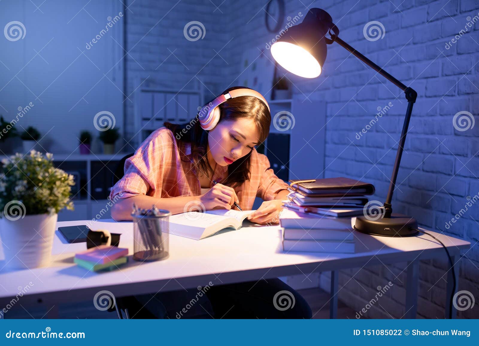 Asian student study hard stock photo. Image of earphones - 151085022