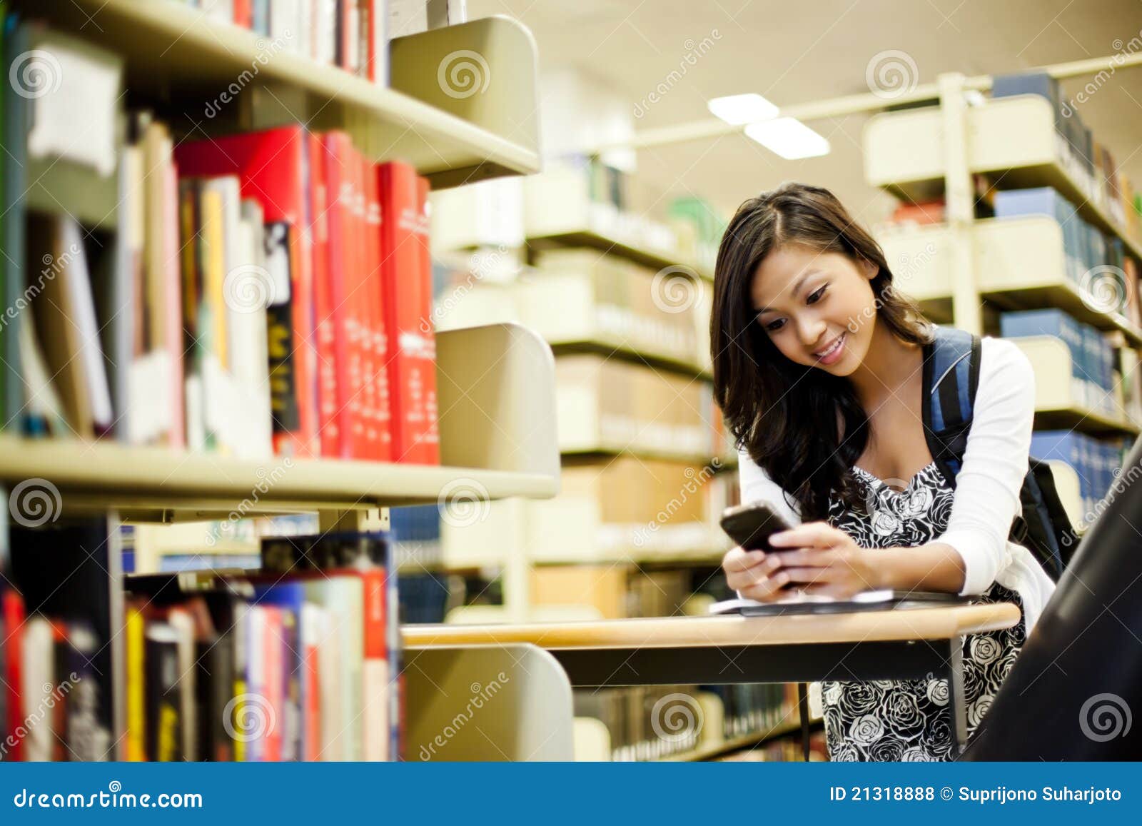 Asian student texting stock photo. Image of communication - 21318888