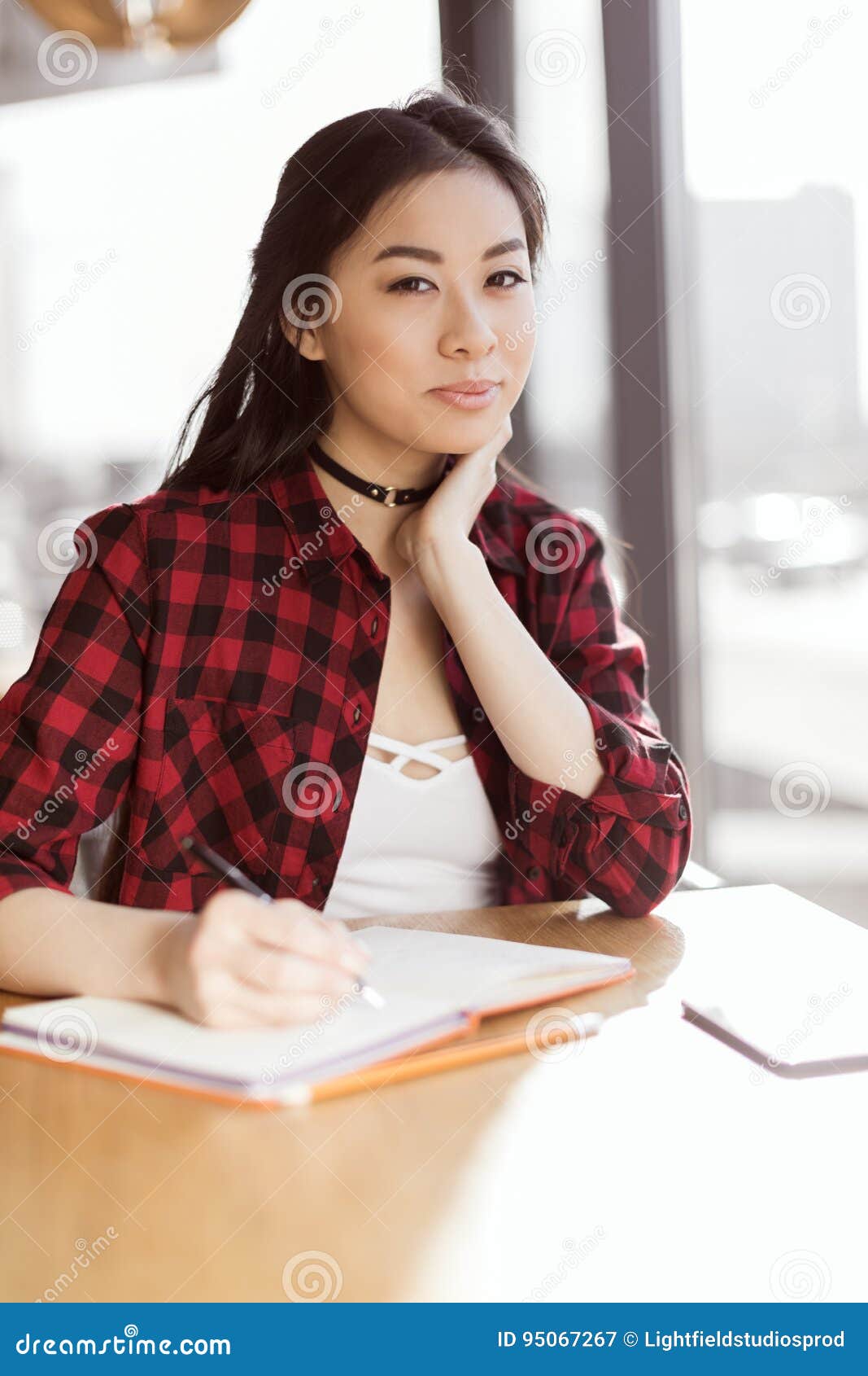 Asian Student Writing in Diary and Sitting in Cafe Stock Image - Image ...