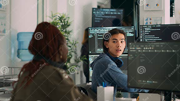 Asian System Engineer Asking Coder for Help with Html Code Stock Photo ...